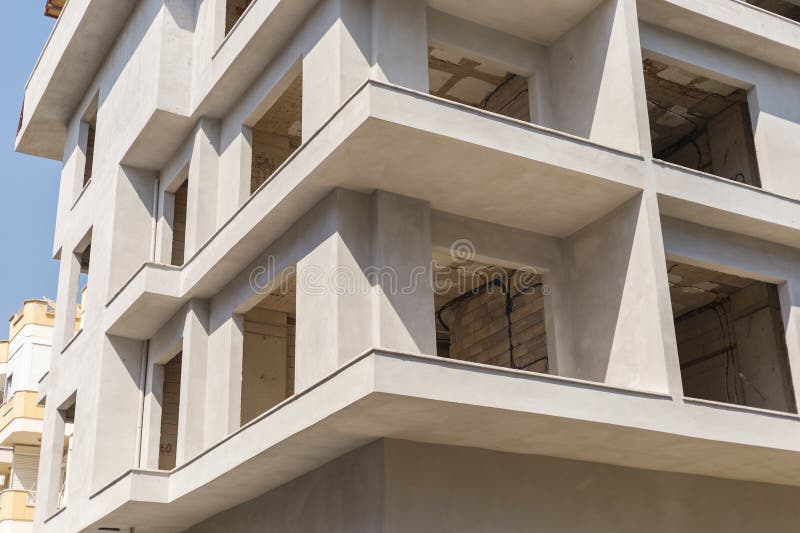 A Contemporary Structure Features Sharp Lines and Large Windows at ...