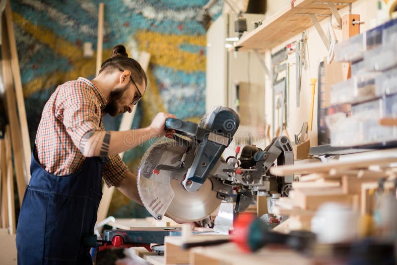 Contemporary Worker Cutting Wood Stock Image - Image of artisan ...