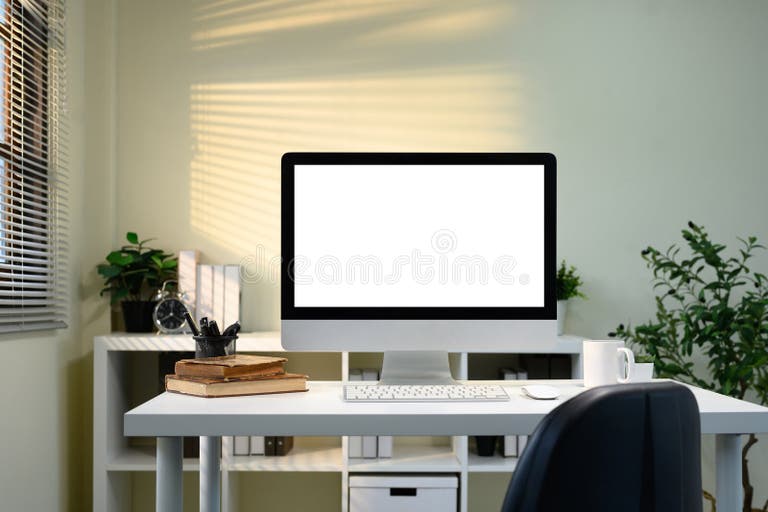 Contemporary Workplace with Desktop Computer, Classic Books, and Soft ...