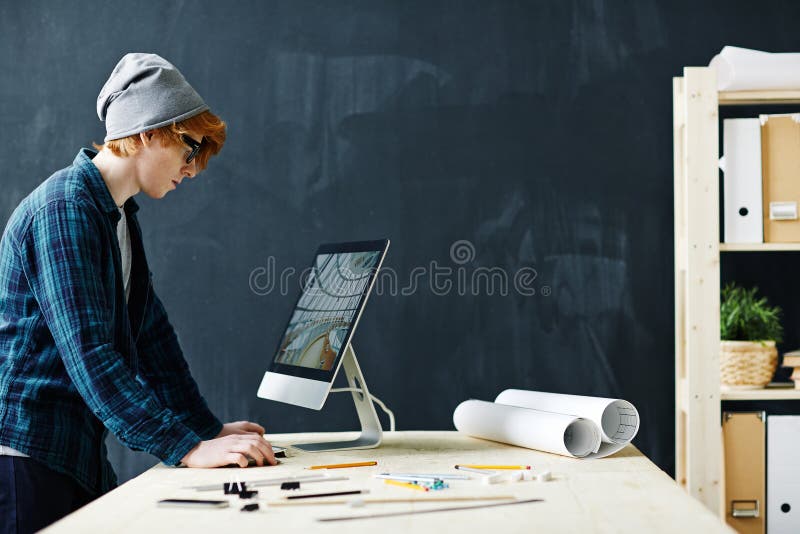 Contemporary Young Engineer at Workplace Stock Photo - Image of ...