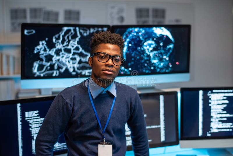 Contemporary Young Programmer Standing by Workplace Stock Photo - Image ...