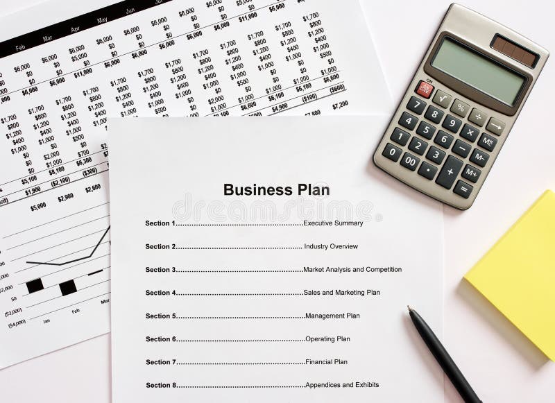 The Content of a Business Plan on an Office Desktop. Business Planning ...
