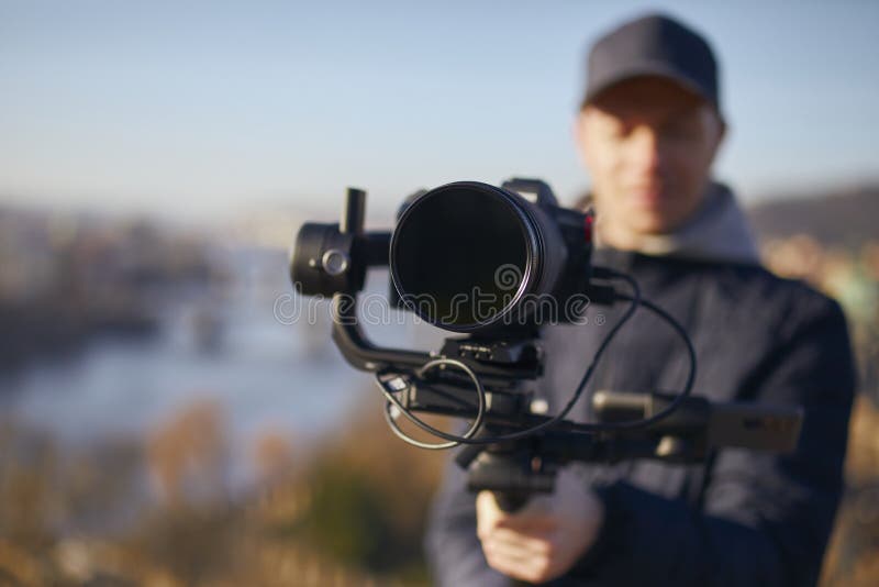 Content Creator during Filming with Camera and Gimbal Stock Image ...