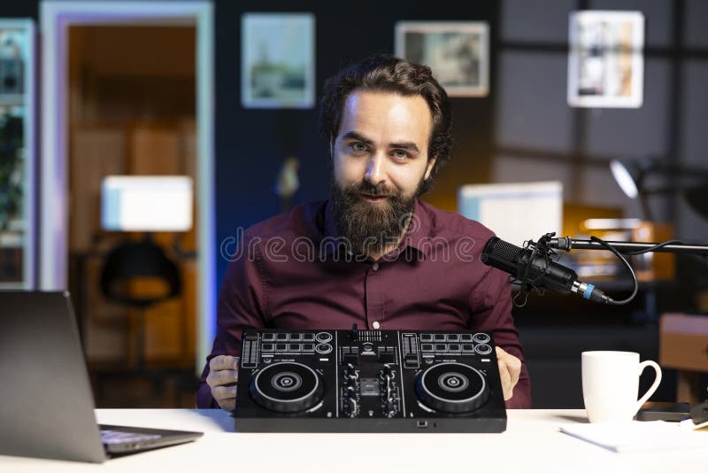 Influencer Showcasing Sound Mixer Device To Viewers Stock Photo - Image ...