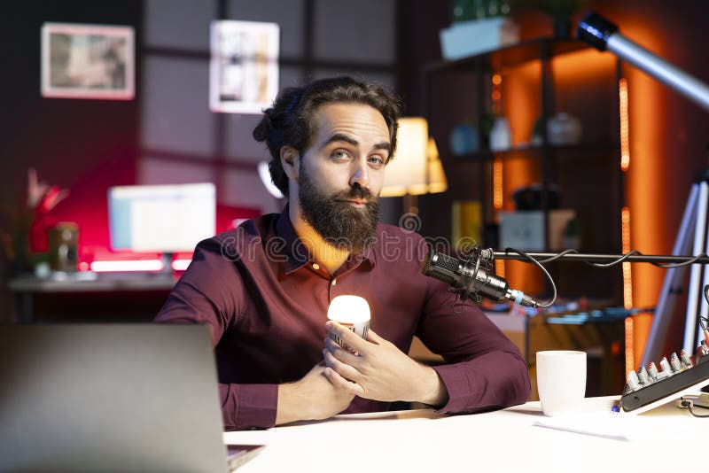 Content Creator Holding Smart Light Bulb Under Face To Create Creepy ...