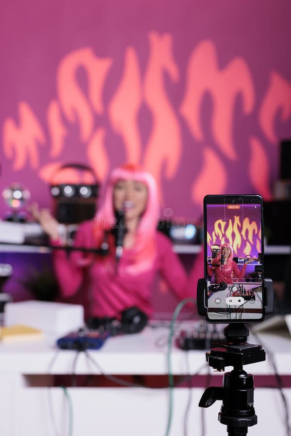 Content Creator Sitting at Desk Table Talking into Microphone with ...