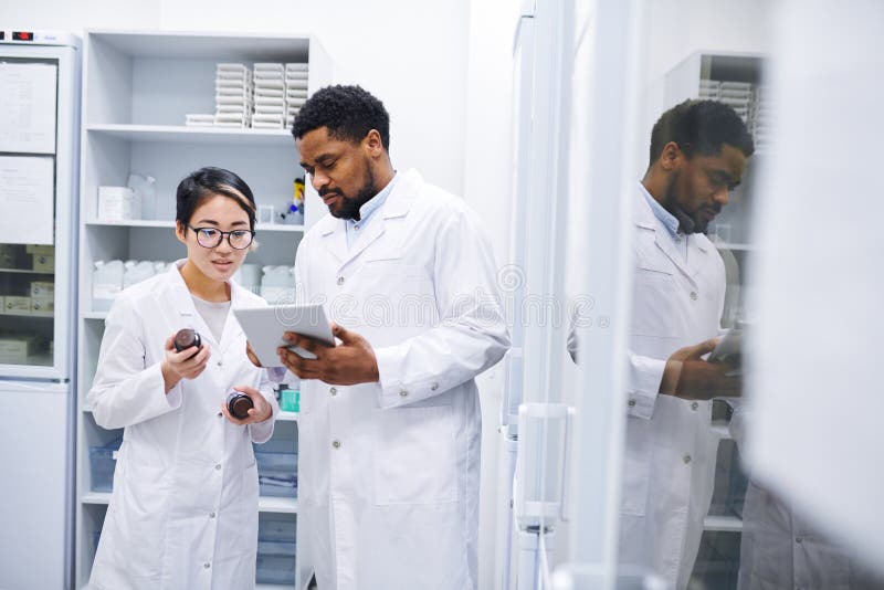 Comparing Information about Pills Stock Image - Image of chemistry ...