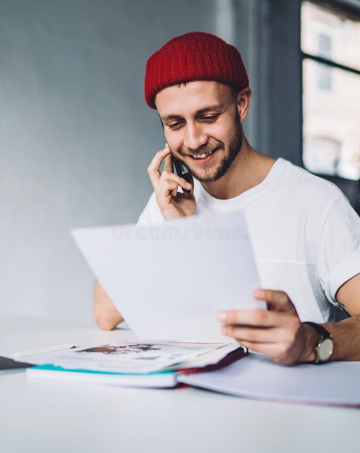 Content Hipster Male with Paper Talking on Phone Stock Image - Image of ...
