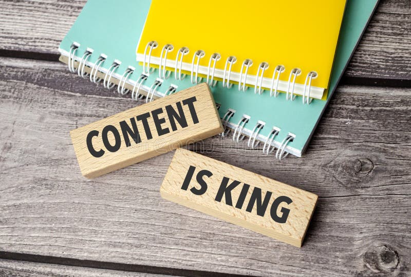 Content is King Words on Wooden Blocks and Colourful Notepads Stock ...