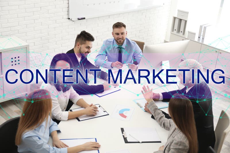 Content Marketing Strategy. Team of Professionals Working at Table in ...
