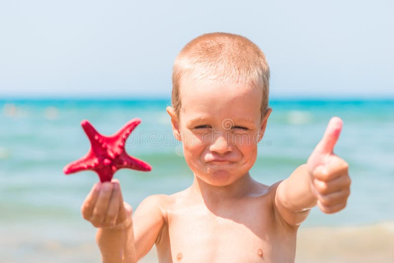 Contented Little Boy on the Sea Stock Image - Image of activity, boys ...