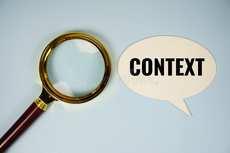 Context Text on Speech Bubble with Magnifying Glass Top View on Blue ...