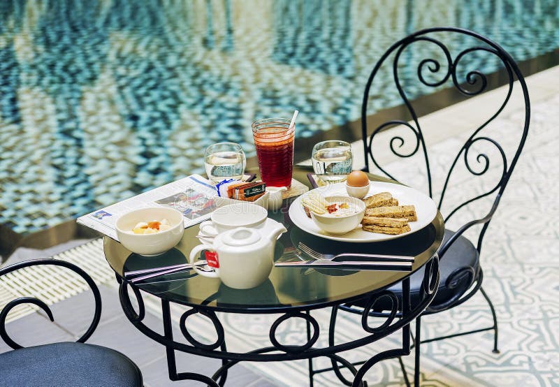 Continental Breakfast Set at Hotel Poolside Editorial Image - Image of ...