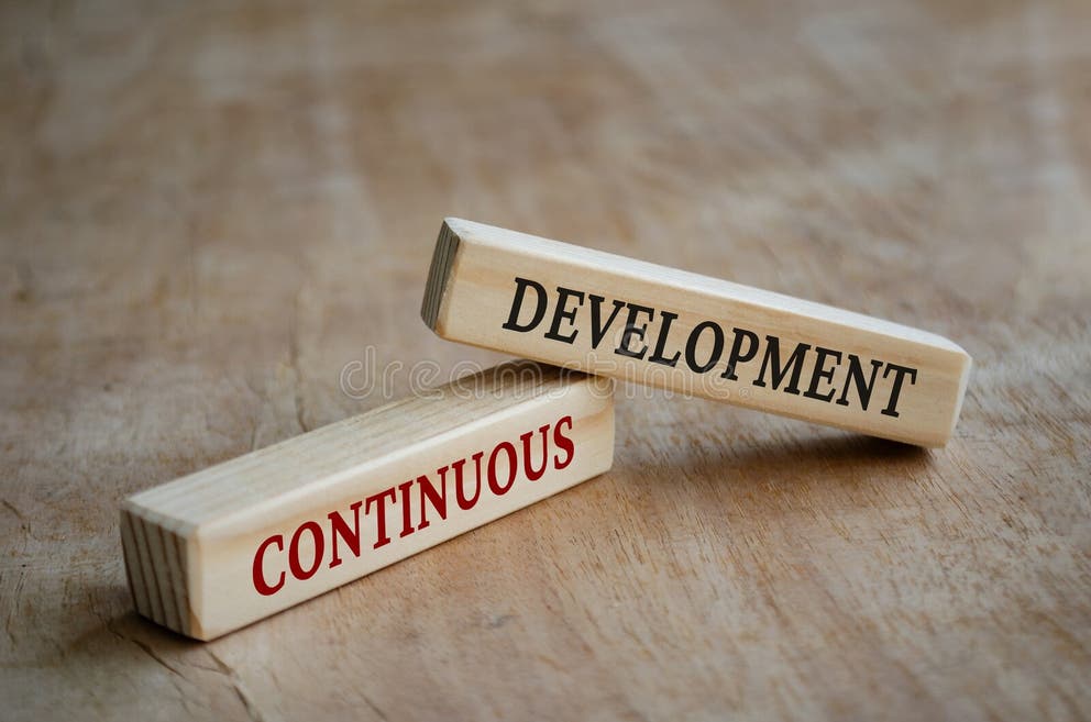 Continuous Development Text on Wooden Blocks. Development Concept Stock ...