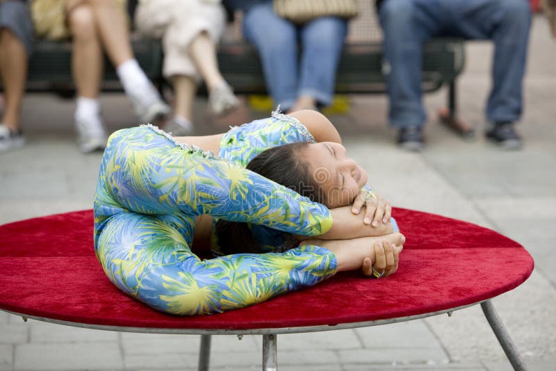 The contortionist editorial stock photo. Image of apple - 20520668