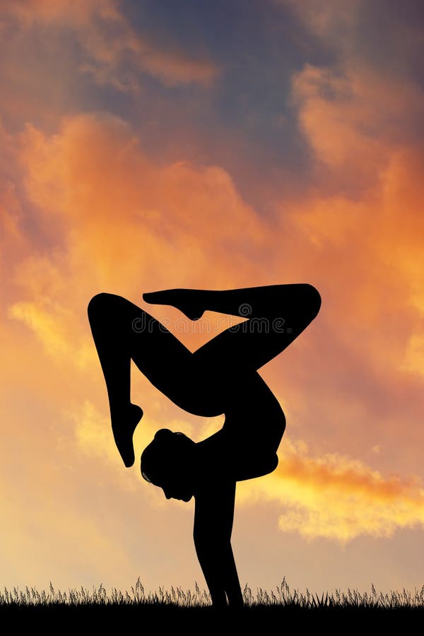 Contortionist at sunset stock image. Image of leisure - 113708305