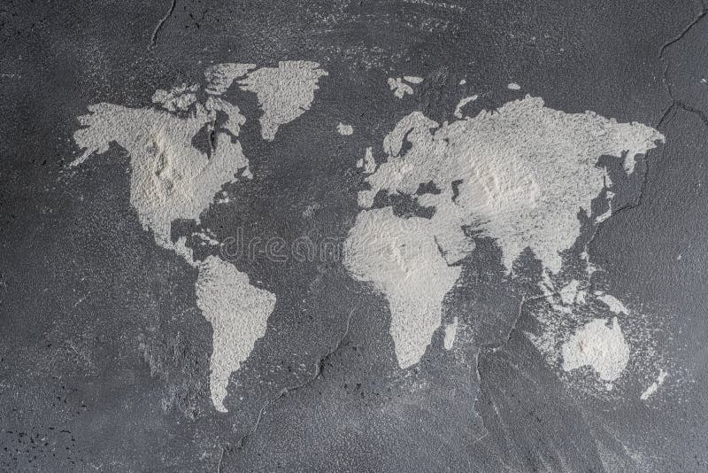 The Contours of the Map of the World from Flour on a Stone Surface ...