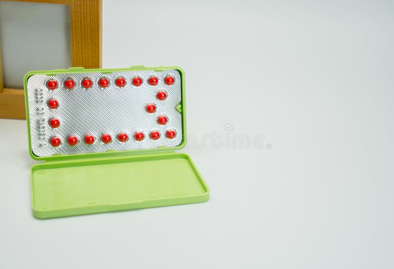 Contraceptive Pills With Pink Flower Stock Photo - Image of bleeding ...