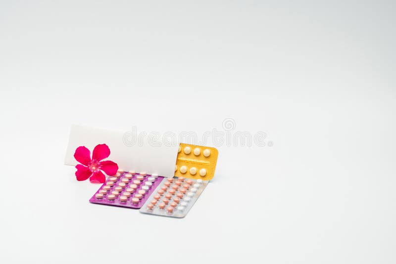 Contraceptive Pills With Pink Flower Stock Photo - Image of bleeding ...