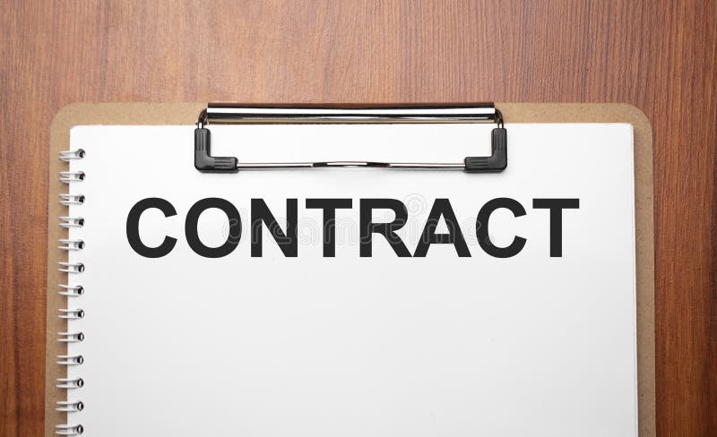 Contract Text on White Paper on the Wood Table Stock Photo - Image of ...