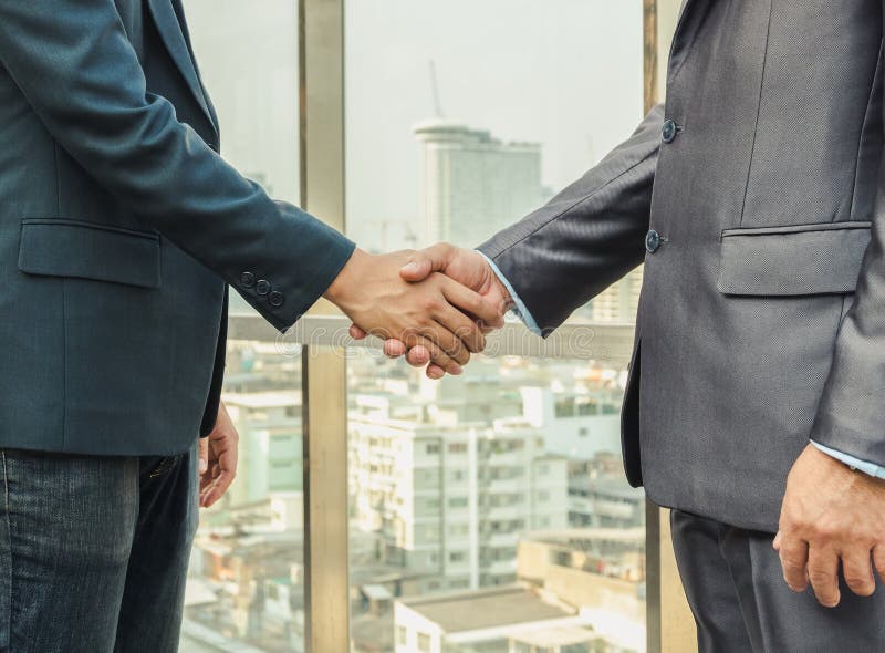 Contracting by handshake stock image. Image of handshake - 93997731