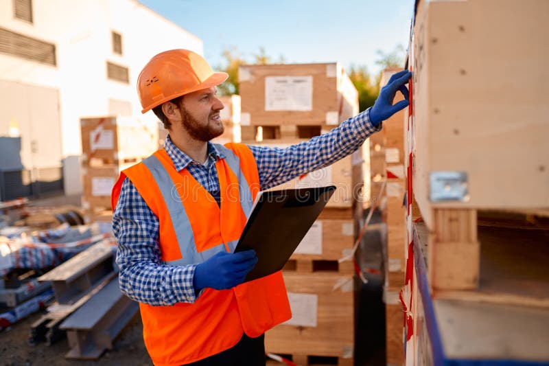 Contractor Check Delivered Parcel at Construction Site Stock Photo ...