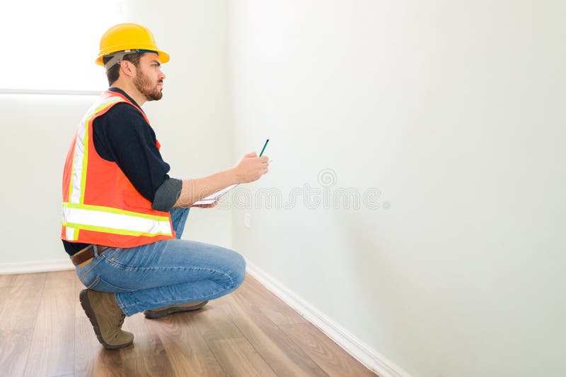 Contractor Checking If the Wall is Well Painted Stock Image - Image of ...