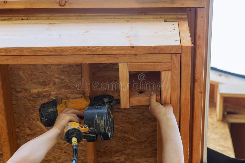 Contractor Framing Up a Wall Section for a Framing Building Custom ...