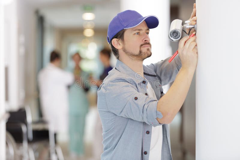 Contractor Installing Cctv Camera in Hospital Stock Image - Image of ...