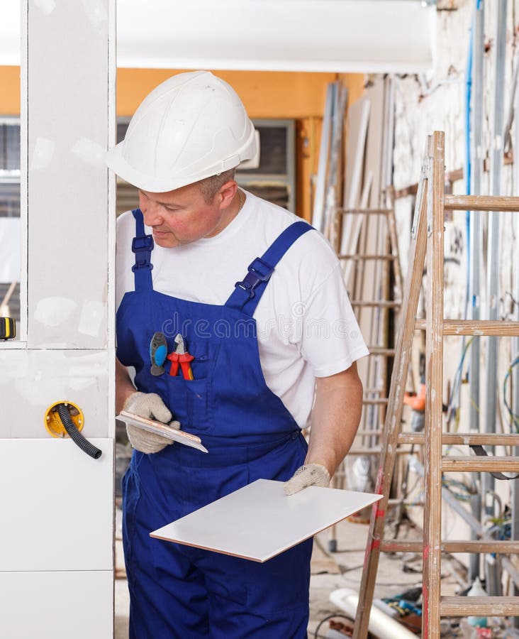 Contractor Installing Ceramic Tile Stock Photo - Image of ceramic ...
