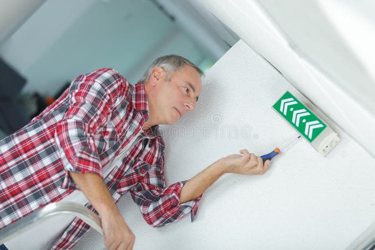 Exit Sign Installing Stock Photos - Free & Royalty-Free Stock Photos ...