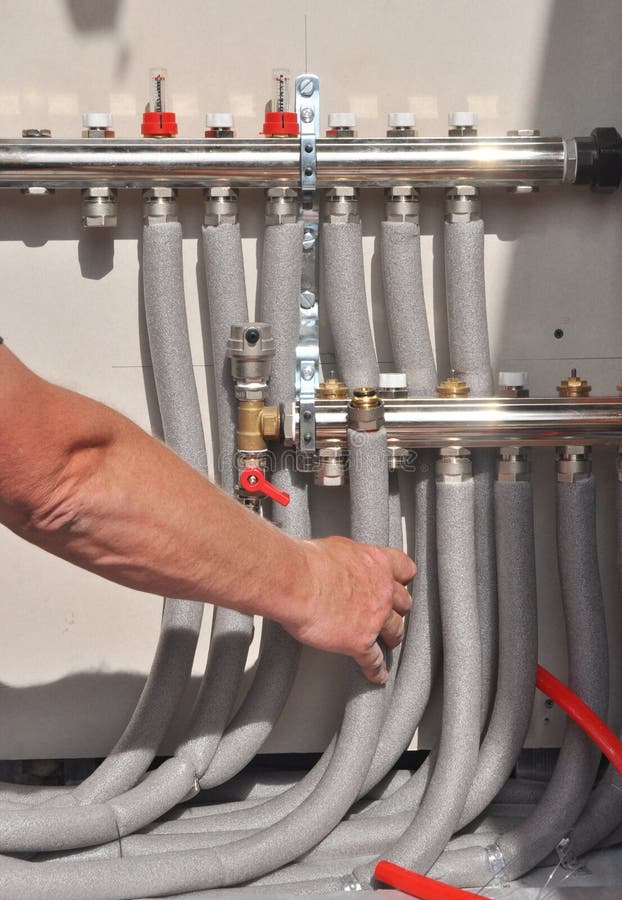 Contractor Installing, Repair Floor Heating System with Insulated Metal ...