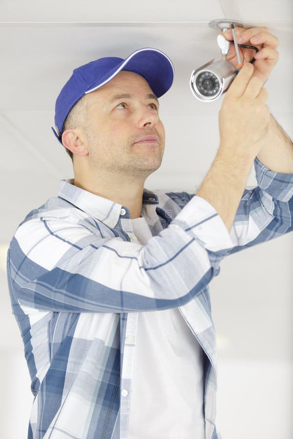 Contractor Installing Surveillance Cctv Cameras in Office Stock Image ...
