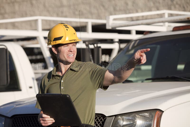 Contractor at jobsite stock image. Image of clipboard - 21544613