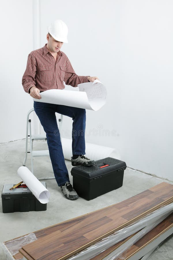 Contractor Looking Blueprints Stock Image - Image of wear, tools: 10601781