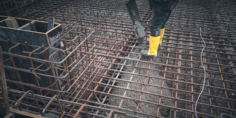 Contractor Pours Cement at Construction Site Stock Photo - Image of ...