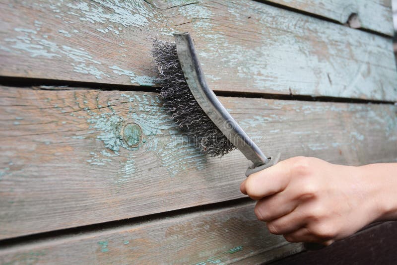 Contractor Removing Old Paint from the Wooden Surface Stock Image ...