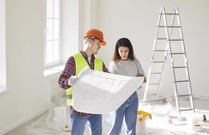 Contractor Discussing Blueprint Estimate Client Stock Photos - Free ...