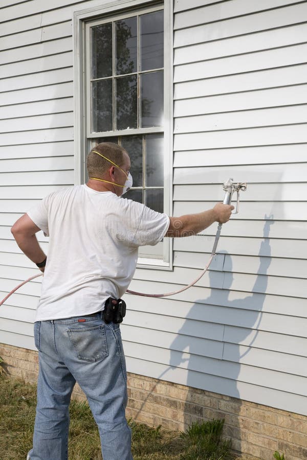Contractor spray painting stock image. Image of inspect - 2933655