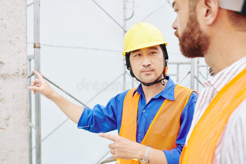 Contractor in Hardhat at Construction Site Stock Photo - Image of ...