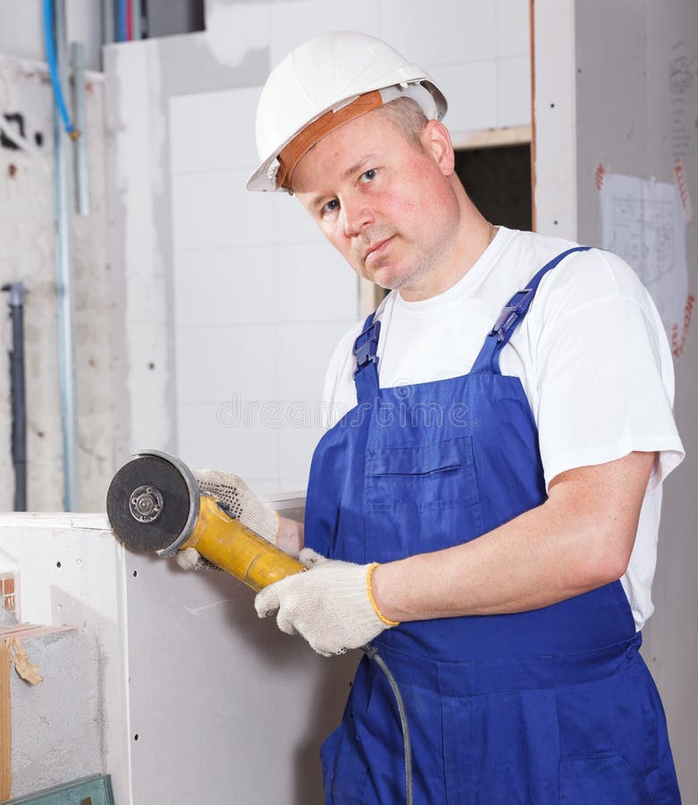 Contractor Using Angle Grinder Stock Photo - Image of angle ...