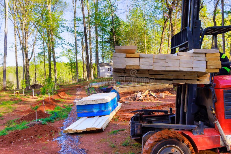 Contractor Using Forklift Working on Delivery Construction of Building ...