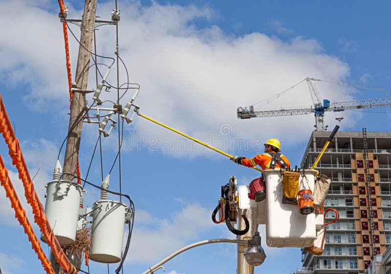 Contractor at Work Fixing Electric Lines Editorial Photo - Image of ...