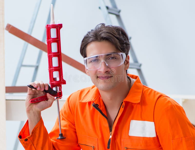 Contractor Working on Laminate Wooden Floor Stock Image - Image of ...