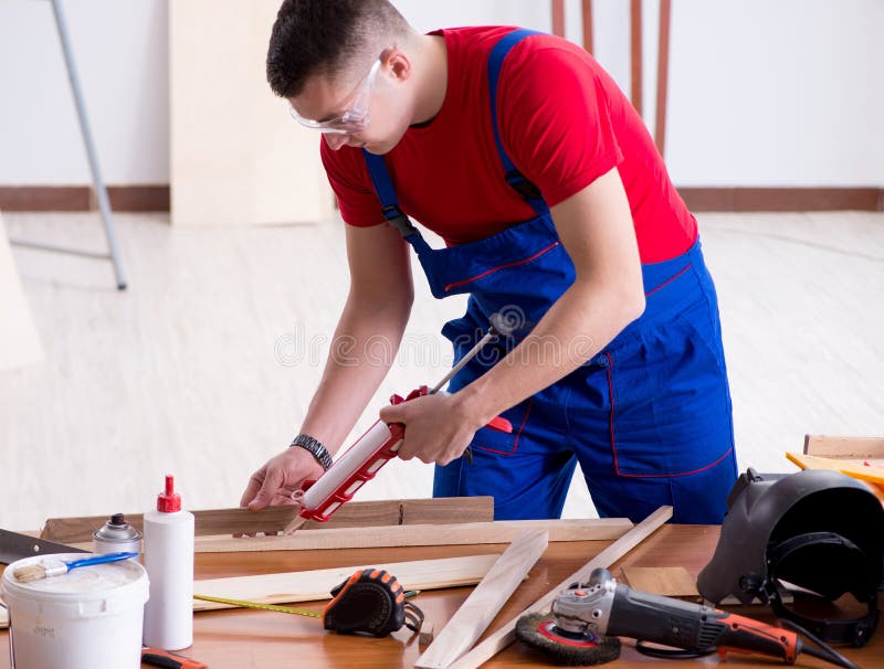 Contractor Working in the Workshop Stock Image - Image of coveralls ...