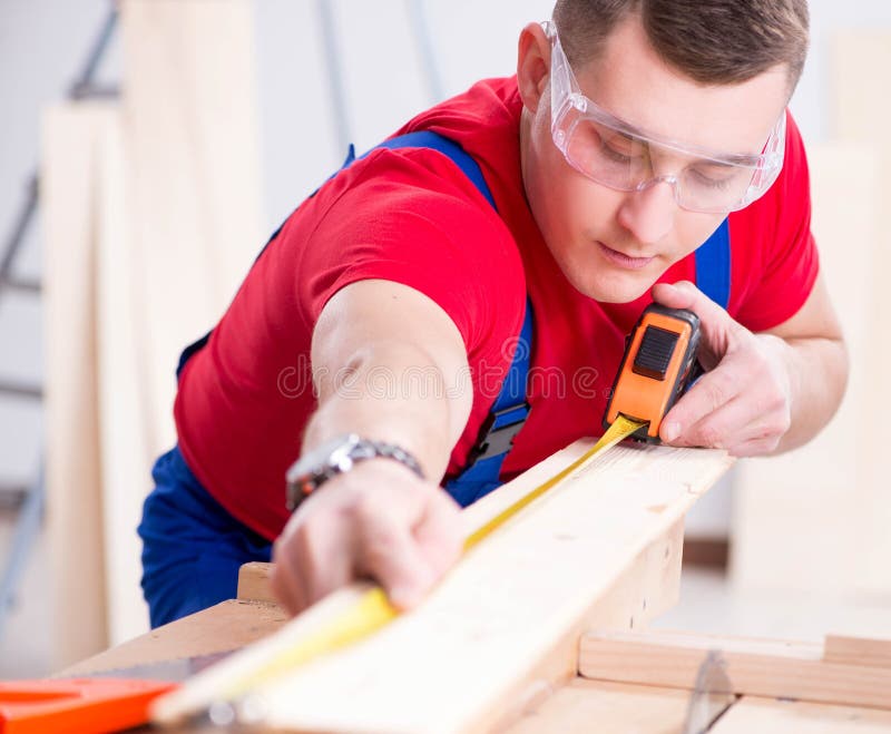 Contractor Working in the Workshop Stock Photo - Image of overalls ...