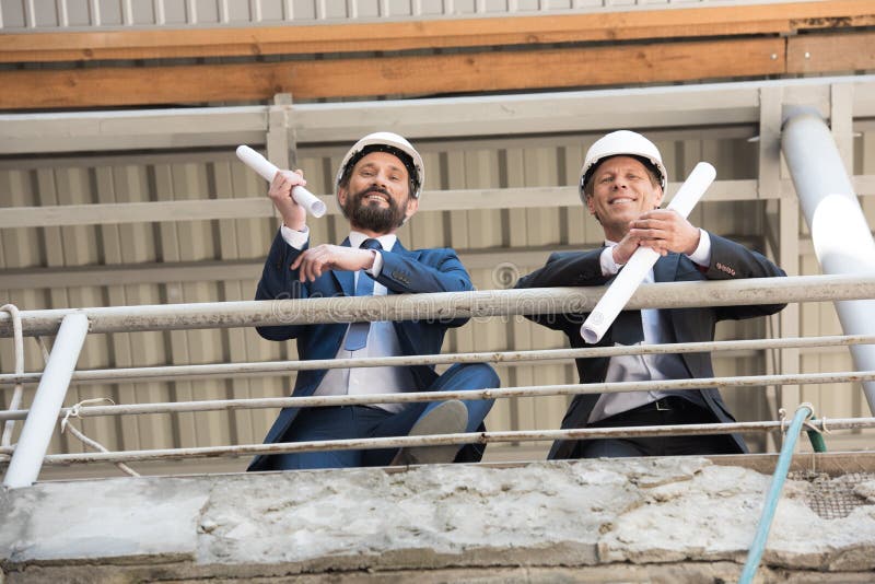 Contractors in Suits Looking at Camera on Construction Site Stock Image ...