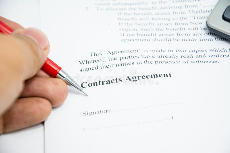 Contracts Agreement Sign on Document Paper Stock Photo - Image of ...