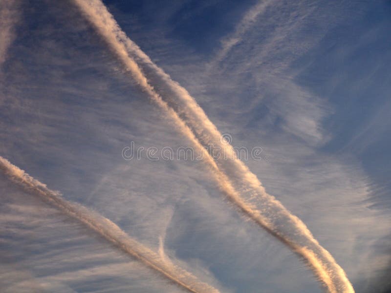 Contrails from a Jet Plane in the Sky Stock Photo - Image of reflection ...