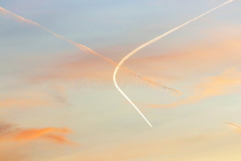 Contrails from Several Airplanes at Sunset Stock Image - Image of ...
